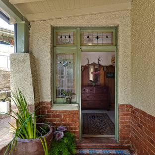 75 Beautiful Terra-Cotta Tile Entryway with a Green Front Door Pictures ...