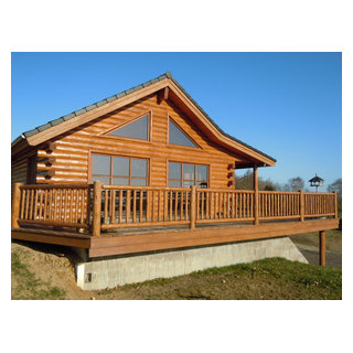 Cedar half log siding with butt-n-pass corners - Rustic - Exterior ...