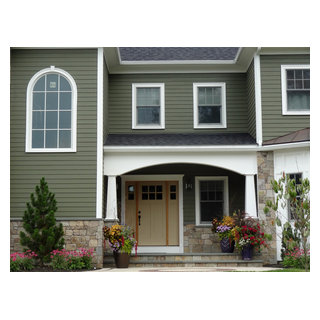 Combining Colonial Tan Natural Stone with Olive Green Siding ...