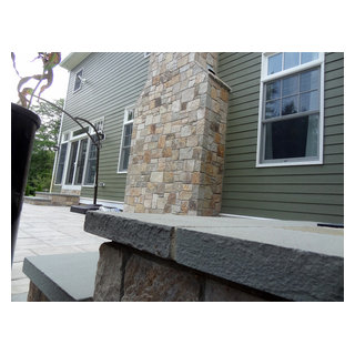 Combining Colonial Tan Natural Stone with Olive Green Siding ...