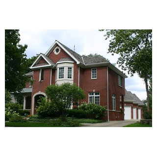 Custom Brick Home with 3-Car Attached Garage - Traditional - Exterior ...