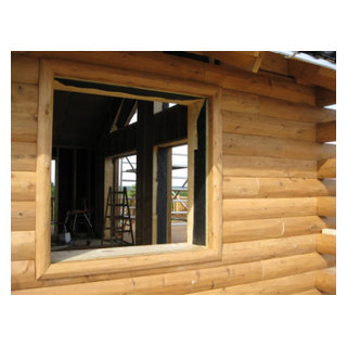 D trim hewn window trim with half log siding - Rustic - Exterior ...