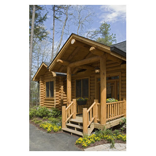 Exterior of a rustic round log and timber home - Traditional - Exterior ...