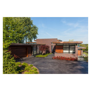 Lac La Belle - Modern Brick Lake Home with Dock and Boathouse - Modern ...