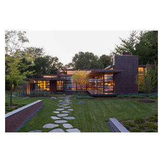 Lac La Belle - Modern Brick Lake Home with Dock and Boathouse - Modern ...