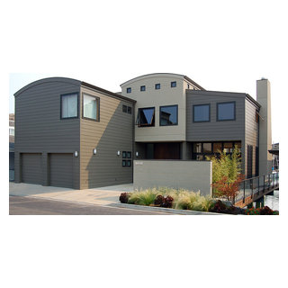 Materials and architectural forms describe living areas in the house ...