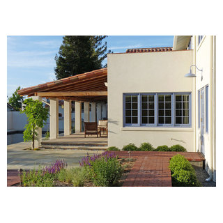 Mission style residential design with covered loggia opening to outdoor ...