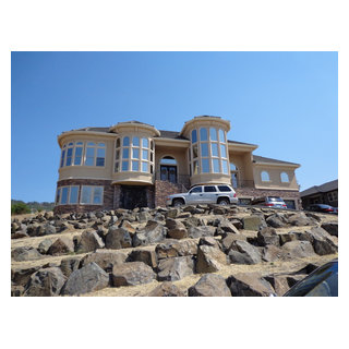 Modern home using large turrets to capture the views! - Traditional ...