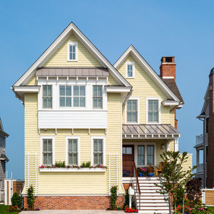 75 Beautiful Beach Style Yellow Exterior Ideas & Designs - May 2021 ...