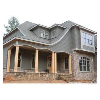 Stone, shake, arches, columns, board and batten - Classique - Façade ...