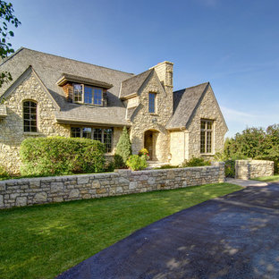 75 Beautiful Traditional Exterior Home with a Clipped Gable Roof ...