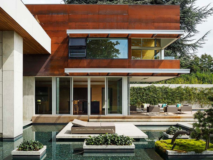 Example of a mid-sized trendy two-story metal exterior home design ...