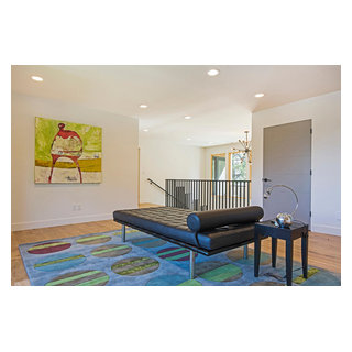 Contemporary Living Space with Sputnik Chandelier and Modern Gray Door ...
