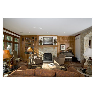 Family Room Featuring Knotty Cherry Wall Paneling and Stone Fireplace ...