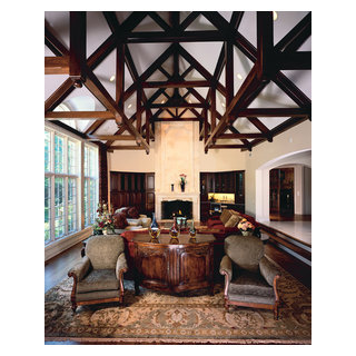 Great Room Features Vaulted Ceiling with Beams and Floor to Ceiling ...