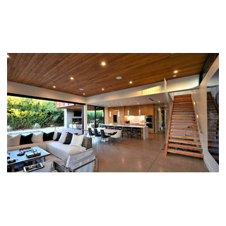 Pre-finished cedar wood ceilings and soffits add warmth to this modern ...
