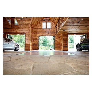 Ultimate man cave and sports car showcase - Traditional - Garage - New ...