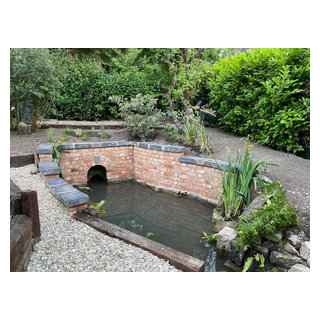 Ditch with stream to small canal water/pond feature - Traditional ...