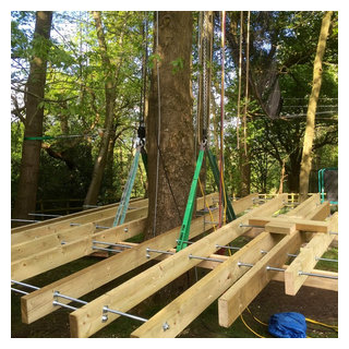 Log Rope Bridge leading to a 'floating' suspended treehouse - Rustic ...