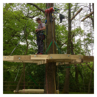 Log Rope Bridge leading to a 'floating' suspended treehouse - Rustic ...