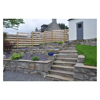 Natural stone walls and step risers with sandstone step treads ...