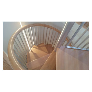 Spiral stairs with wood maple treads and handrail. - Rustic - Staircase ...