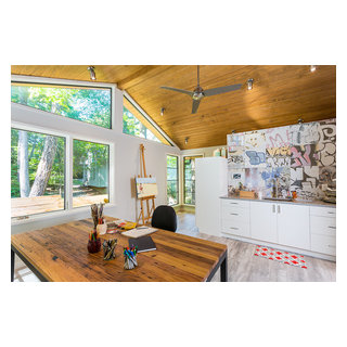 Art studio work wall with painting storage behind. - Contemporary ...