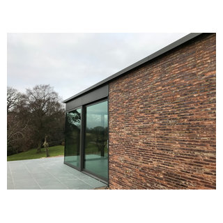 Contemporary glass to glass corner window with sliding doors ...