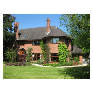 Edwin lutyens styled home with heavy overhanging eaves - Traditional ...