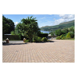 Grand sweeping tegula block driveway with tegula kerb edgings ...