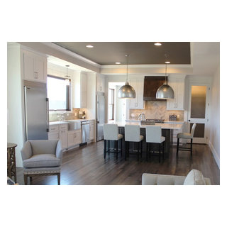 Applestone Homes of Quad Cities White Kitchen With Gray Island ...