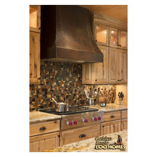 Copper range hood in a rustic kitchen Golden Eagle Log and Timber Homes ...