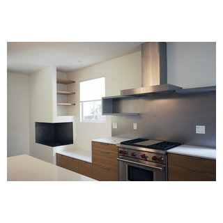 corner fireplace at quartz waterfall window seat - Midcentury - Kitchen ...