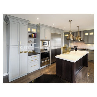 Custom painted grey shaker kitchen with brown stained ma with quartz ...