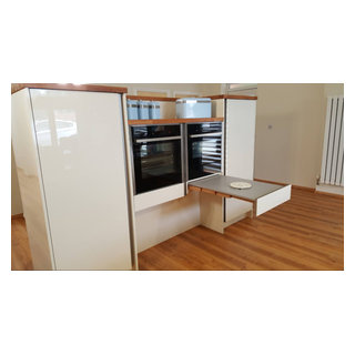 Easy Access Kitchen with Motorised Multi Level Island - Contemporary ...