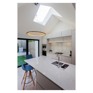 Modern glazed extension with open pitched roof and skylight ...