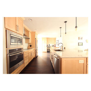 Natural Maple Cabinets in Open Kitchen with Quartz Countertops ...