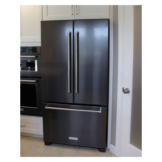 Quad Cities Kitchen With Gray Base Cabinets and Waterfall Counters ...