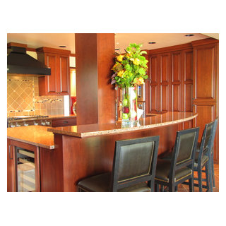 Raised bar seating on curved island - Traditional - Kitchen - Seattle ...