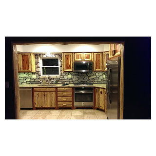 Rustic Red Cedar Kitchen with cultured Stone Backsplash - Rustic ...