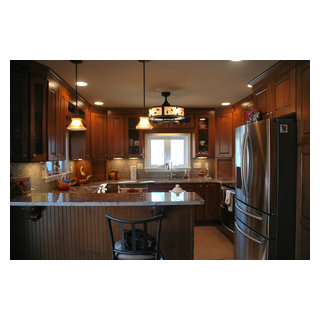 Traditional toffee kitchen remodel with multi-color mosaic tile back ...