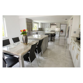 Transitional Kitchen Done in a 2 Tone Color With Integrated Dining ...