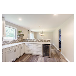 White Cabinets w/ Bar Height Peninsula - Modern - Kitchen - New York ...