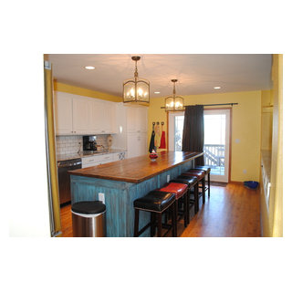 White kitchen with a custom farm table island top. - Country - Kitchen ...