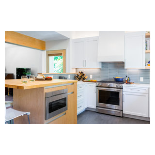 White Kitchen with Accent Maple Butcher Block Breakfast Bar ...