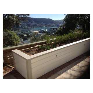 After: weatherboard planter, frameless glass balustrade - Contemporary ...