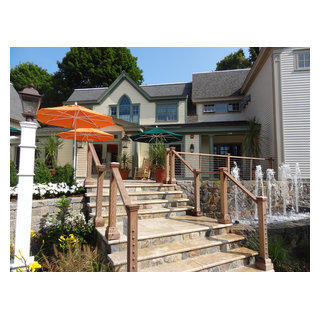 Cape Cod Inn with New England Stone Cladding, Retaining Walls, and ...