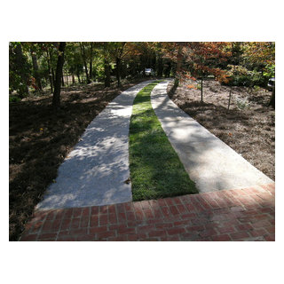 Exposed Aggregate Driveway Strips stained with Gray color and washed ...