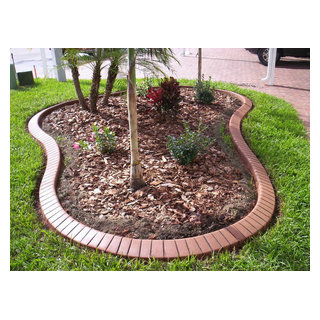 Harvest gold w/ charcoal soldier course brick - Modern - Landscape ...