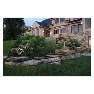 Hillside planting & natural stone boulder outcropping - Traditional ...